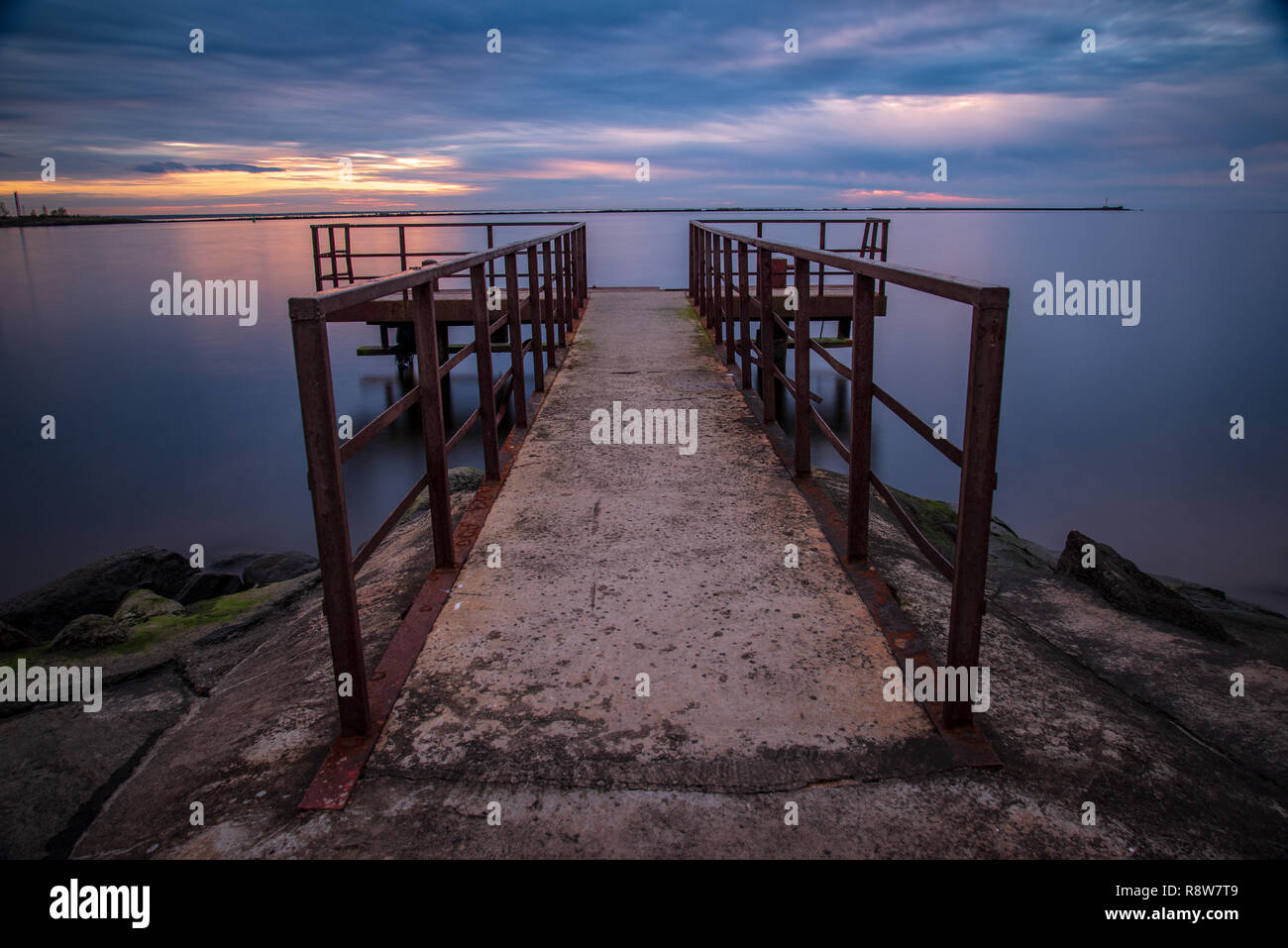 old rusty metal bridge in port. pier in the sea Stock Photo - Alamy