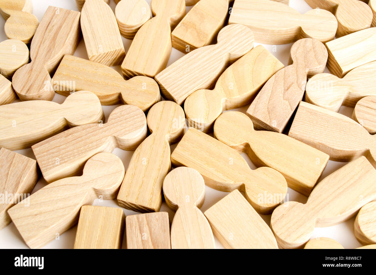 Background from a set of wooden figures of people. A scattering of ...