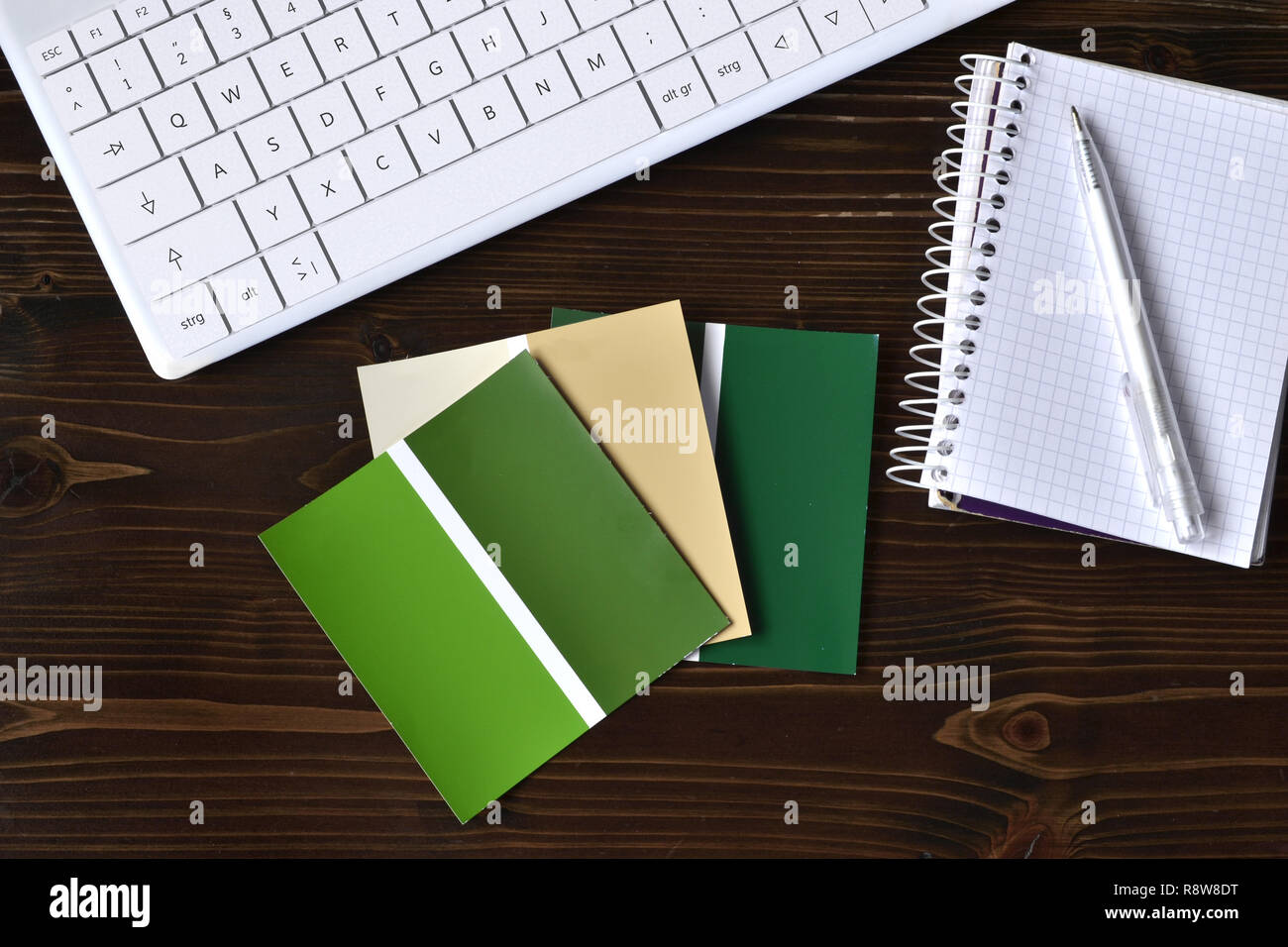 Color samples cmyk on black keyboard desk Stock Photo - Alamy