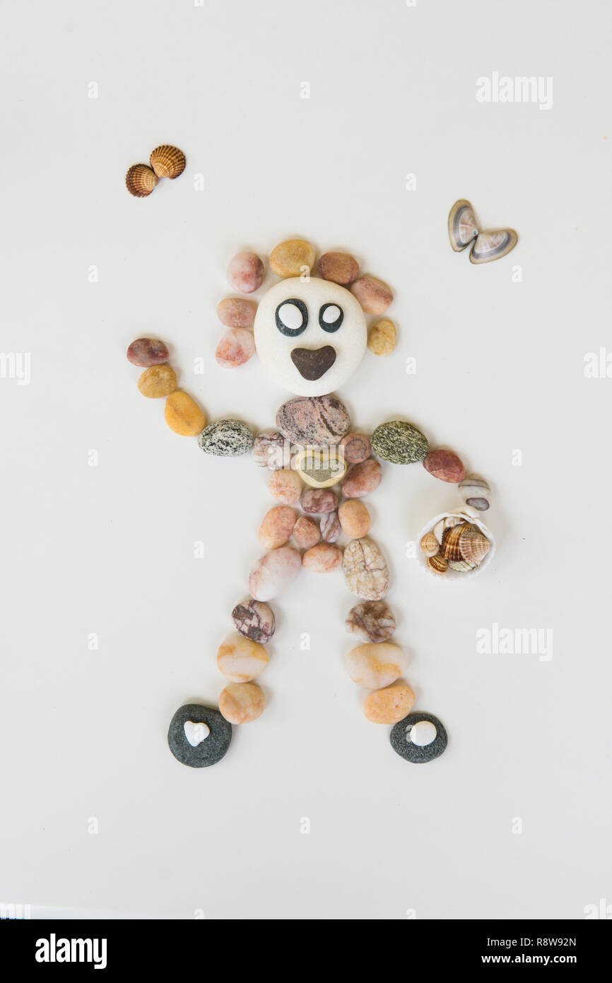 natural art, craft, picture of person, made from pebbles, shells Stock ...