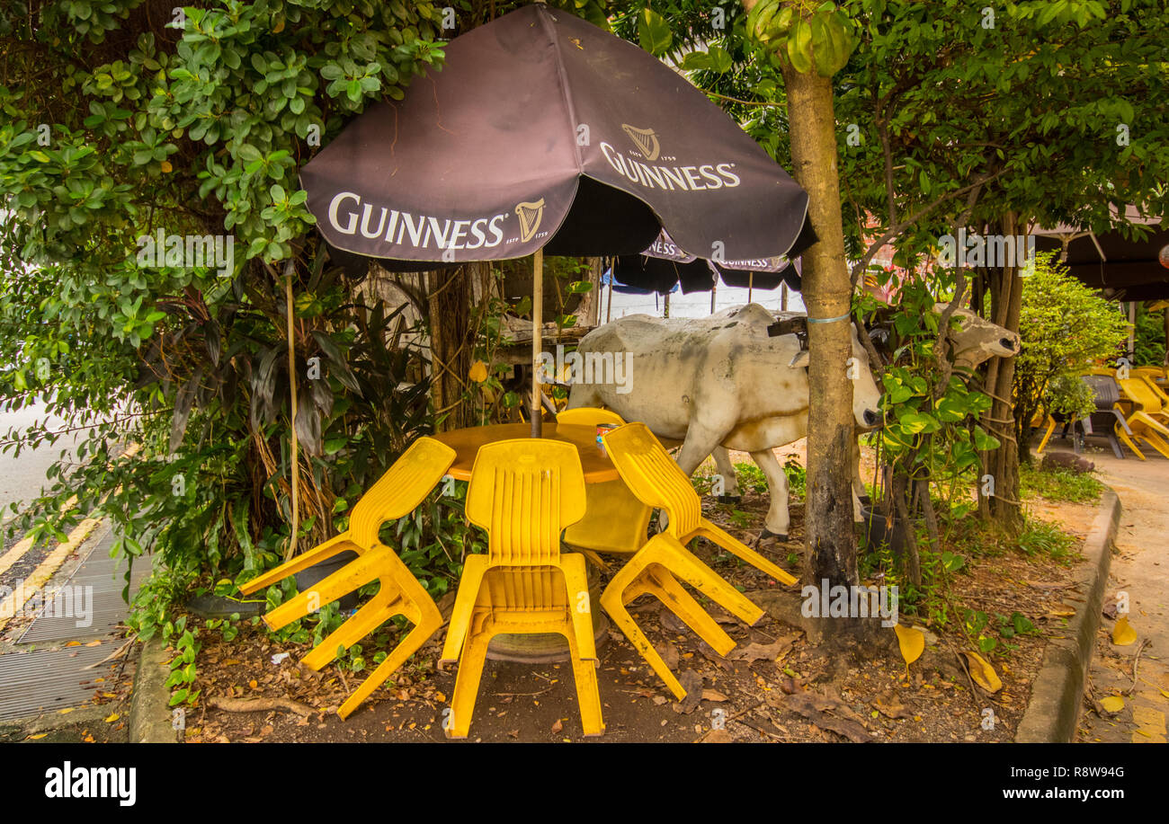Guinness stout table and chairs at bar off Bukit Pasoh Road, Outram ...