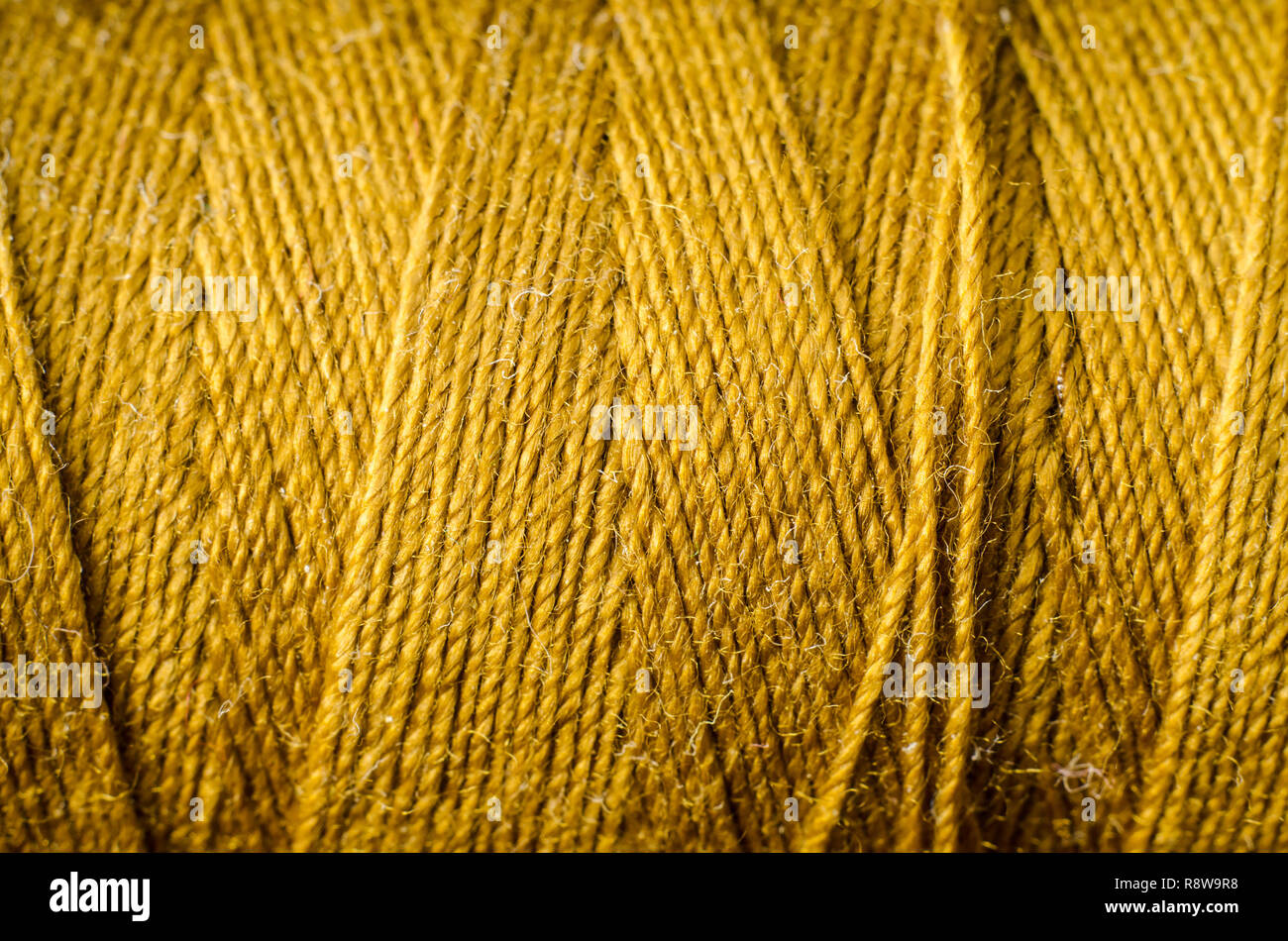 golden thread as a background Stock Photo - Alamy