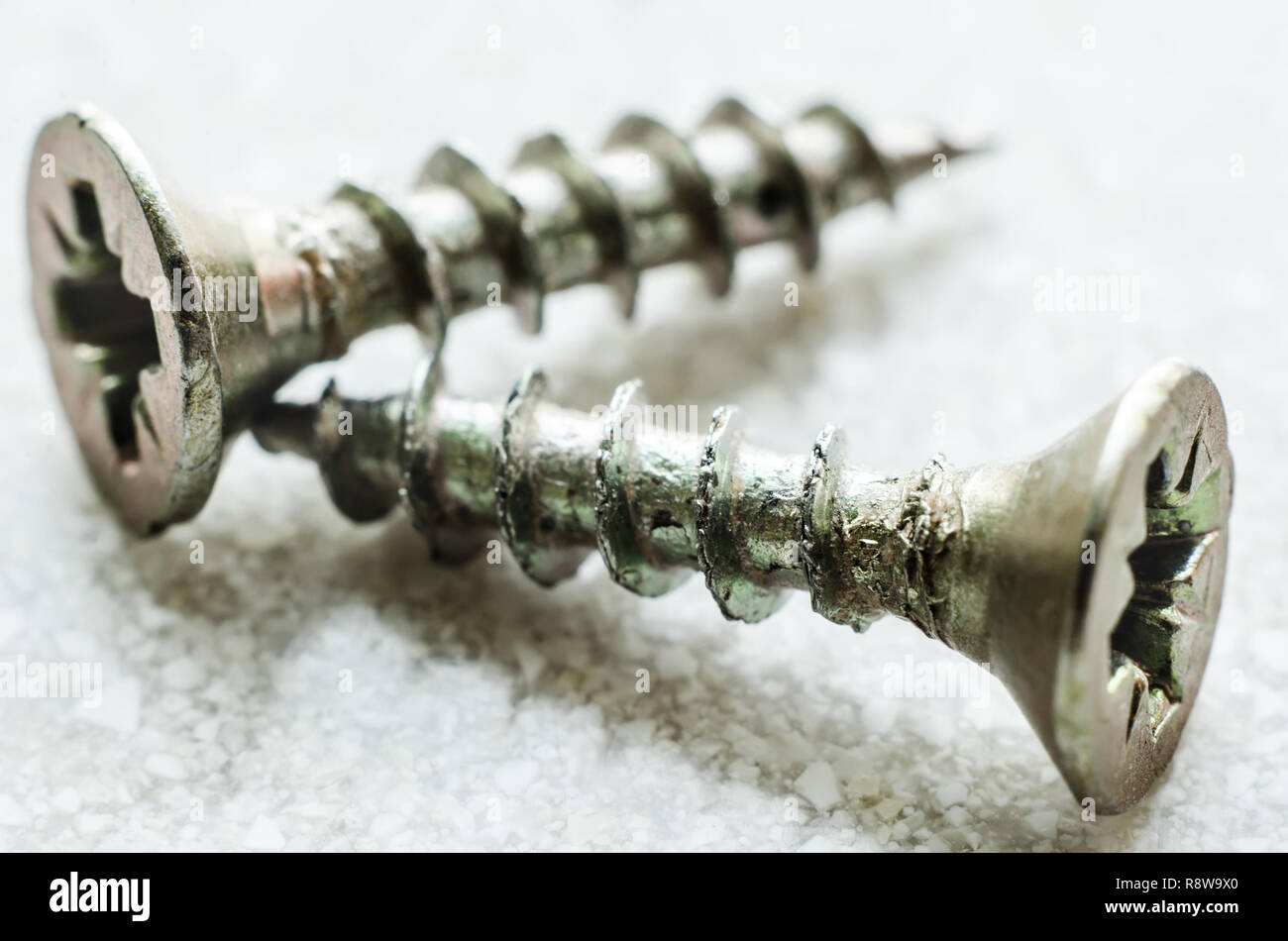 Two iron screws hi-res stock photography and images - Alamy