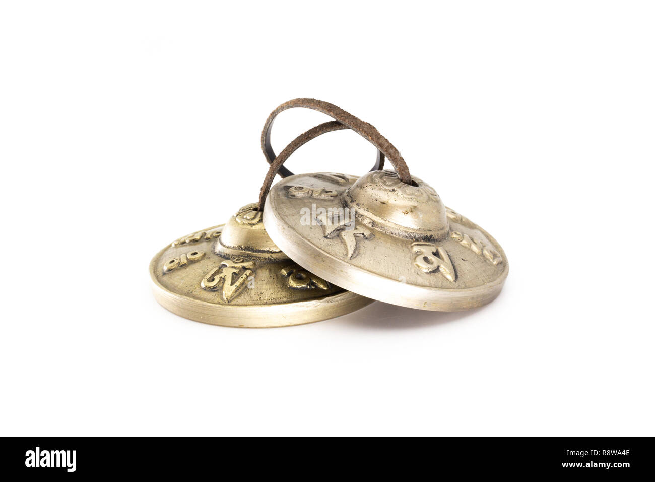 Silver Tibetan tingsha - two cymbals tied with a leather strap ...