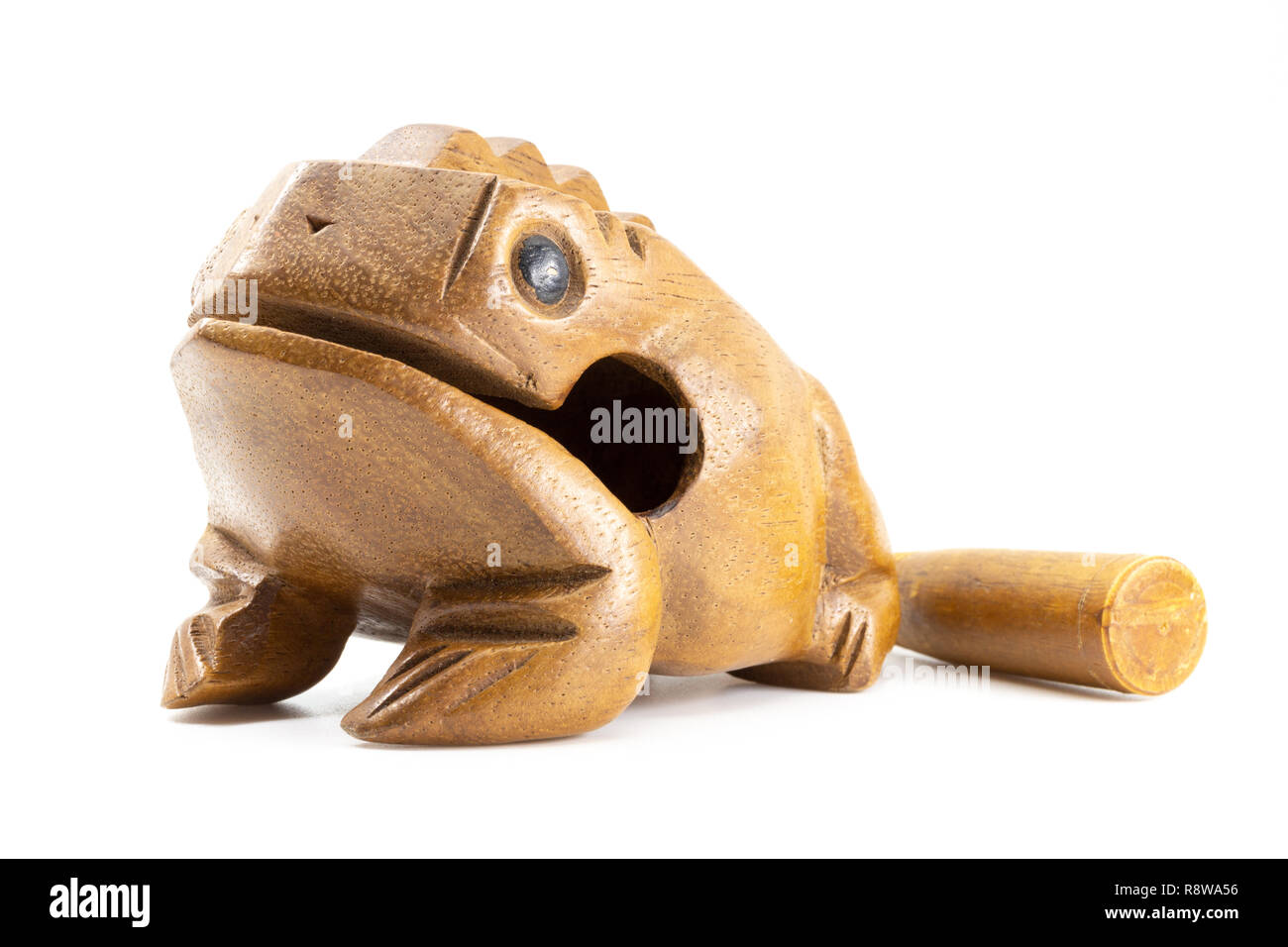Wooden musical instrument - wooden frog with a stick originated from ...