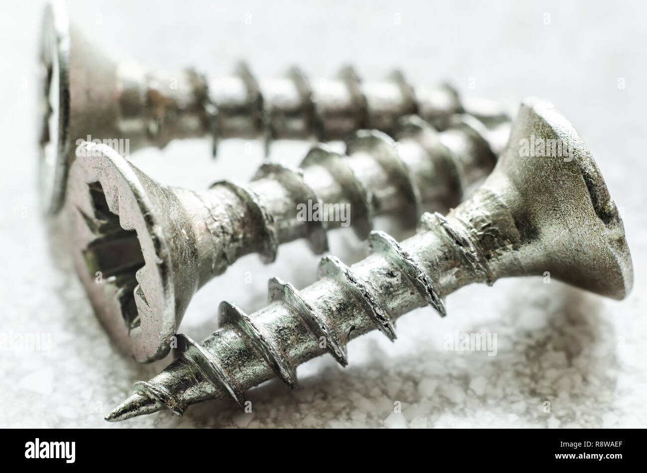 Three metal screws hi-res stock photography and images - Alamy