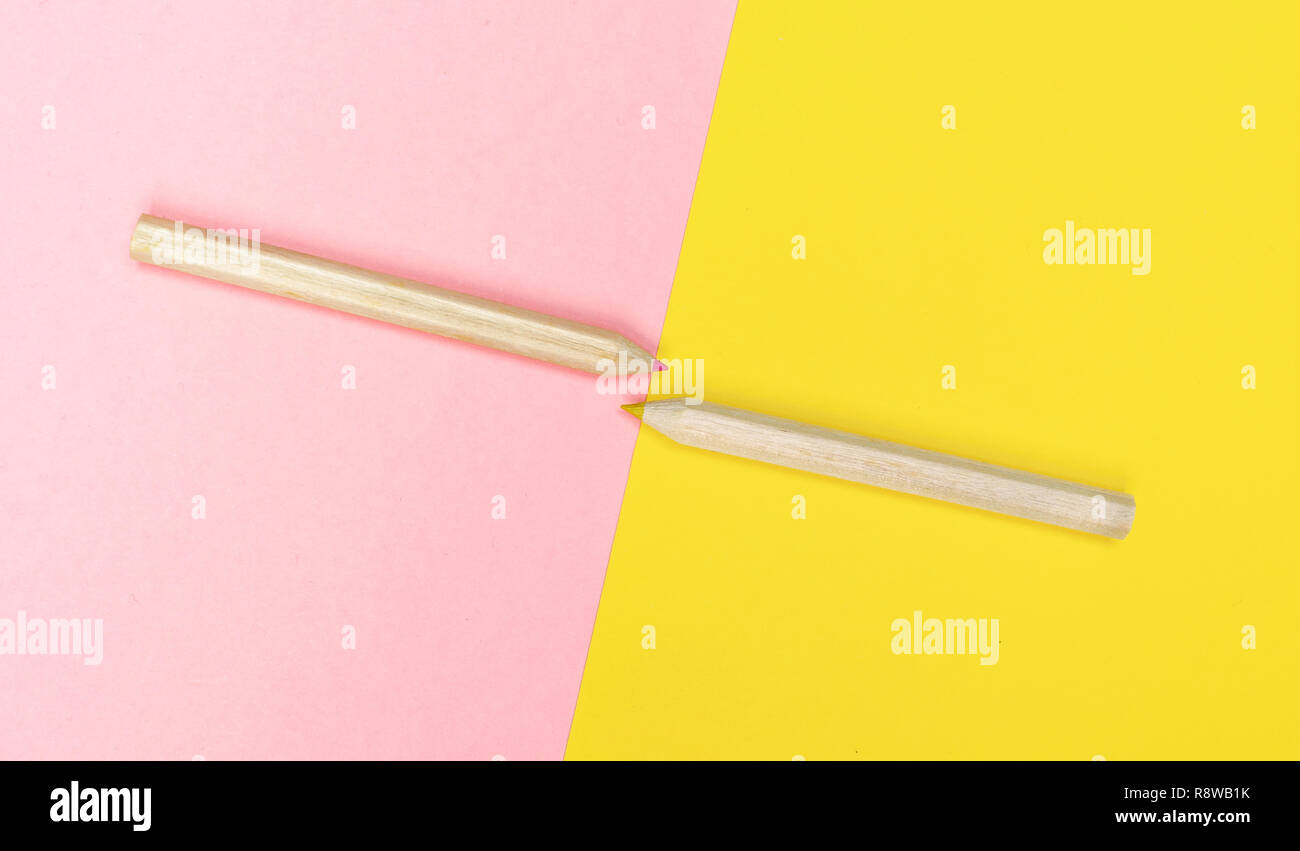 Colored pencils on yellow and pink background. Flat Lay Photography ...