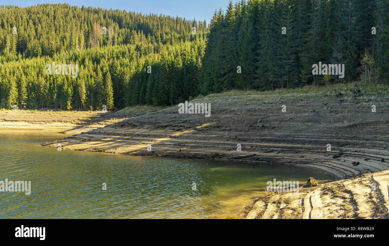 A layered lake shore photo Stock Photo - Alamy
