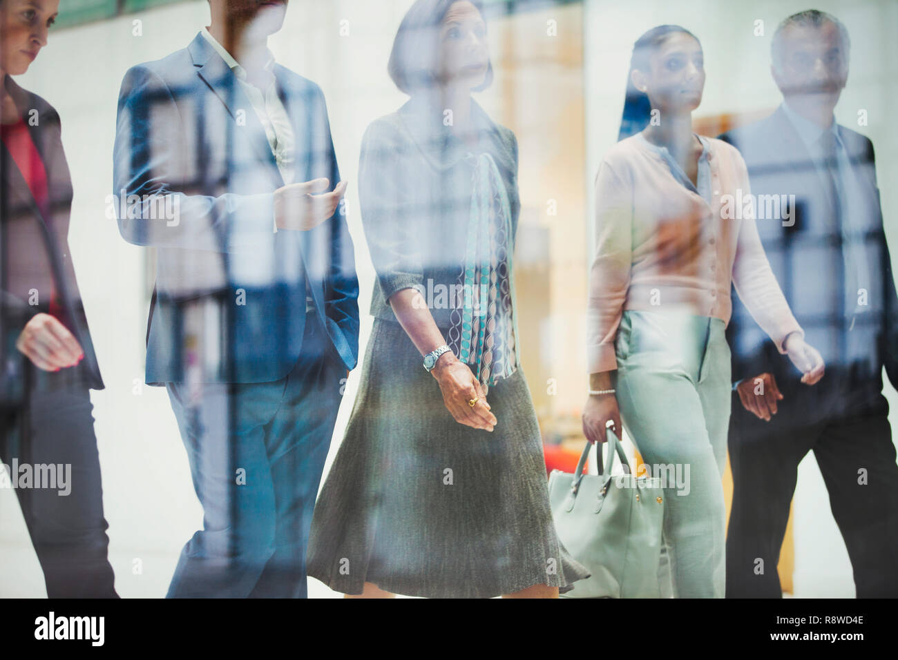 Business people walking Stock Photo - Alamy