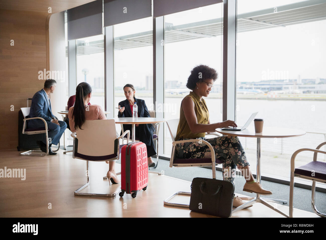 People sitting in waiting lounge hi-res stock photography and images ...