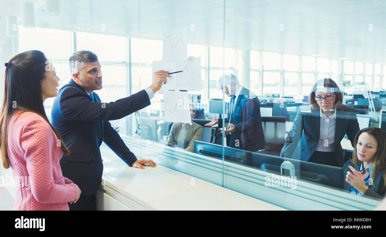 Reviewing data charts business hi-res stock photography and images - Alamy