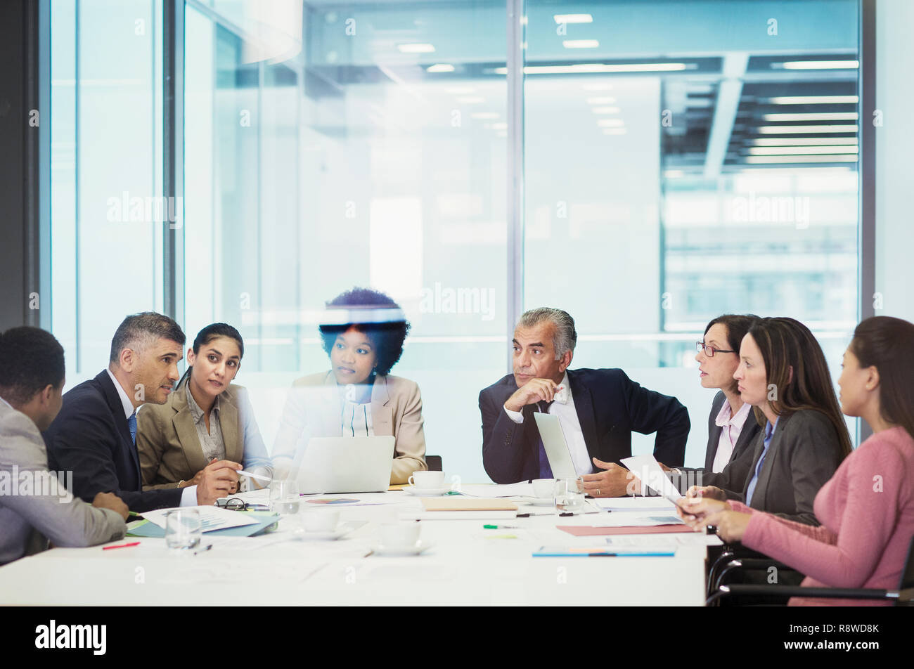 Business people talking in conference room meeting Stock Photo - Alamy