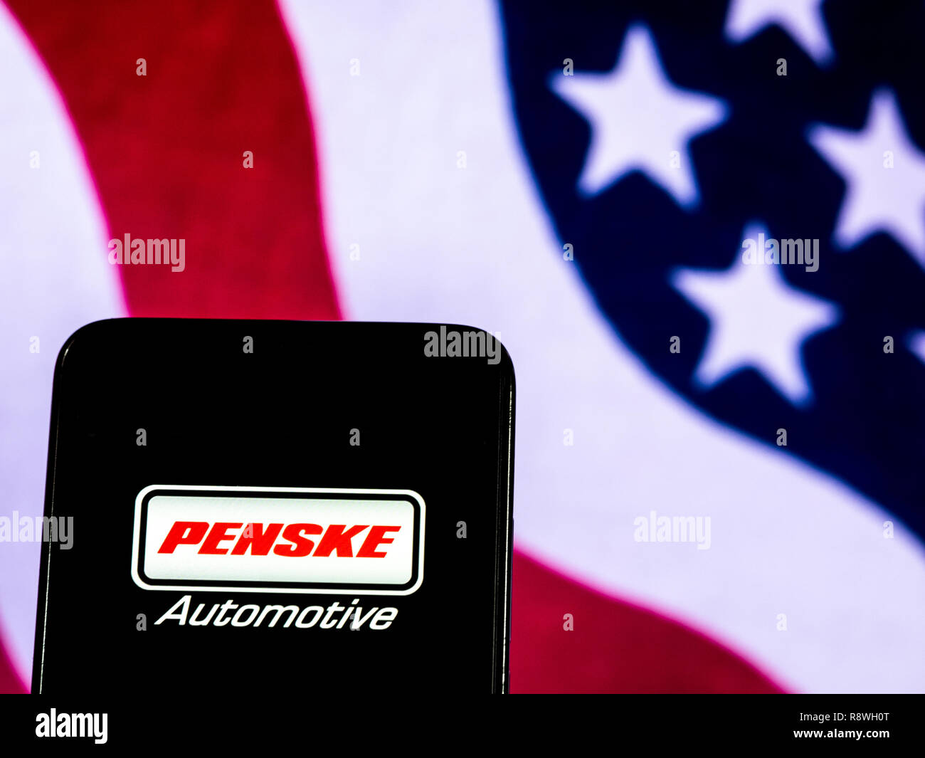 Penske Truck Leasing Company logo seen displayed on smart phone Stock ...