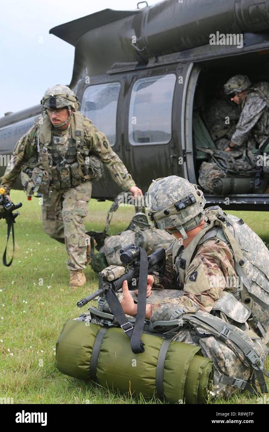 Lt. Col. Aaron Coombs (right) and Command Sgt. Maj. Thomas Abbot (left ...