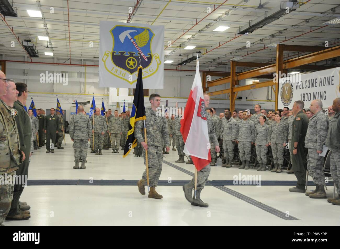 The flags of the 65th Troop Command, Illinois Army National Guard, and ...