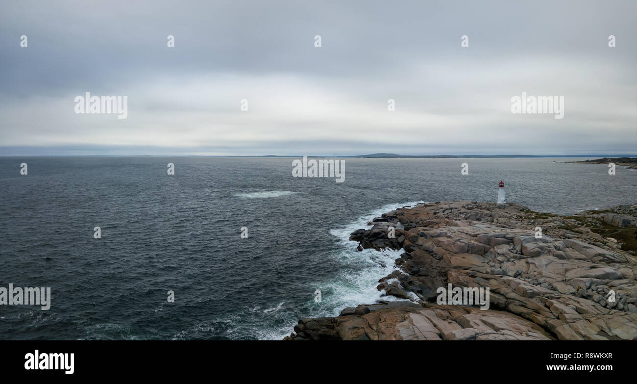 Aerial panoramic view of a Lighthouse on a rocky coast of the Atlantic ...