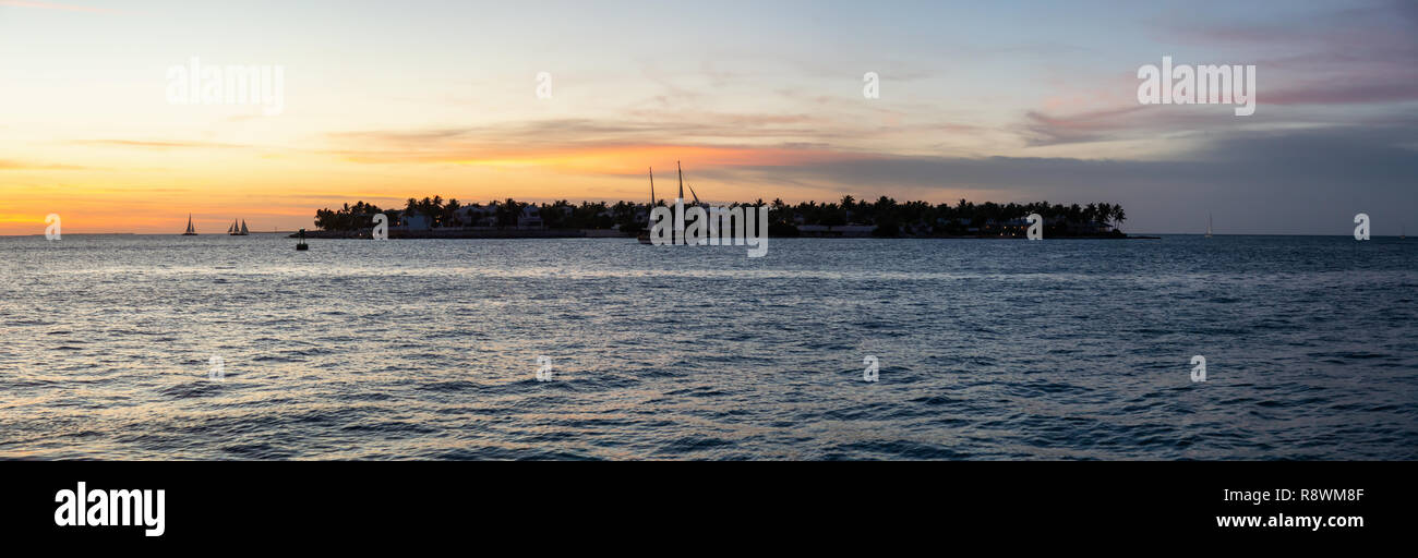 Panoramic view of Sunset Key Island during a vibrant colorful sunset ...