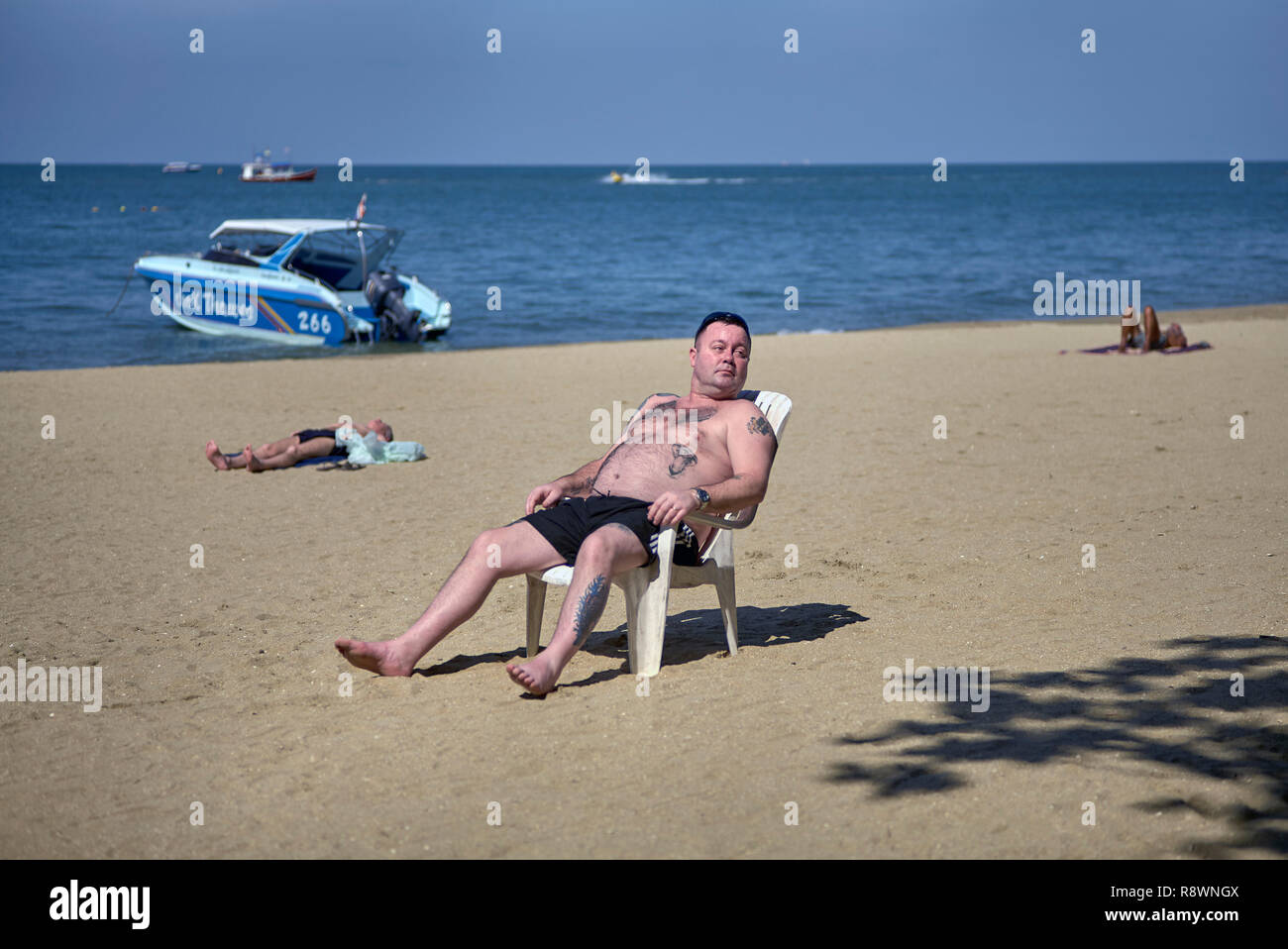 Man beach chair hi-res stock photography and images - Alamy