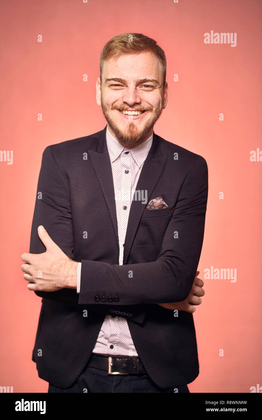 one young man, wearing suit and shirt, 20-29 years old, looking to ...