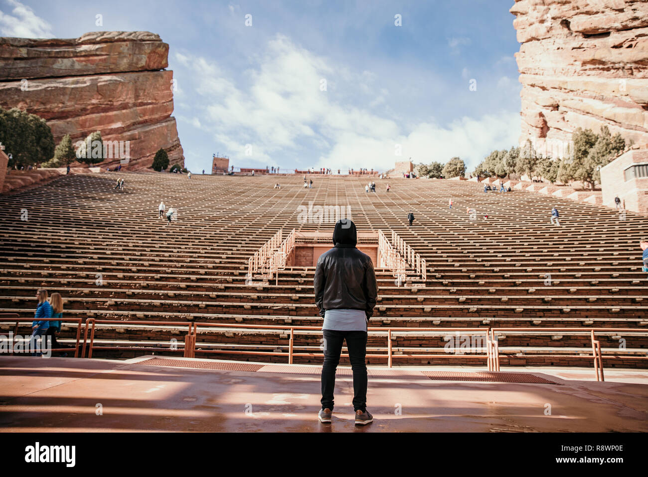 Symmetrical Portrait of Person Standing on a Stage Dreaming while ...