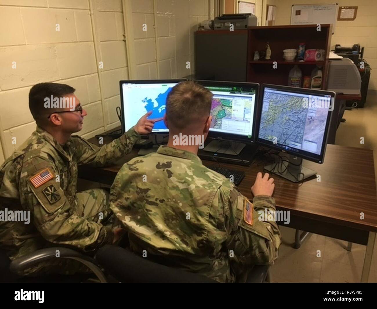 Spc. Ashton Andrade and Spc. Aaron Morris, tactical planner workstation ...