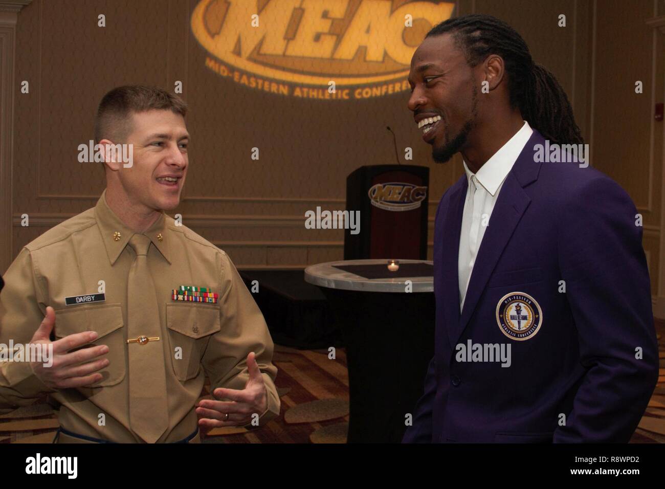 Major Joshua Darby speaks to Rashean Mathis before his induction into ...