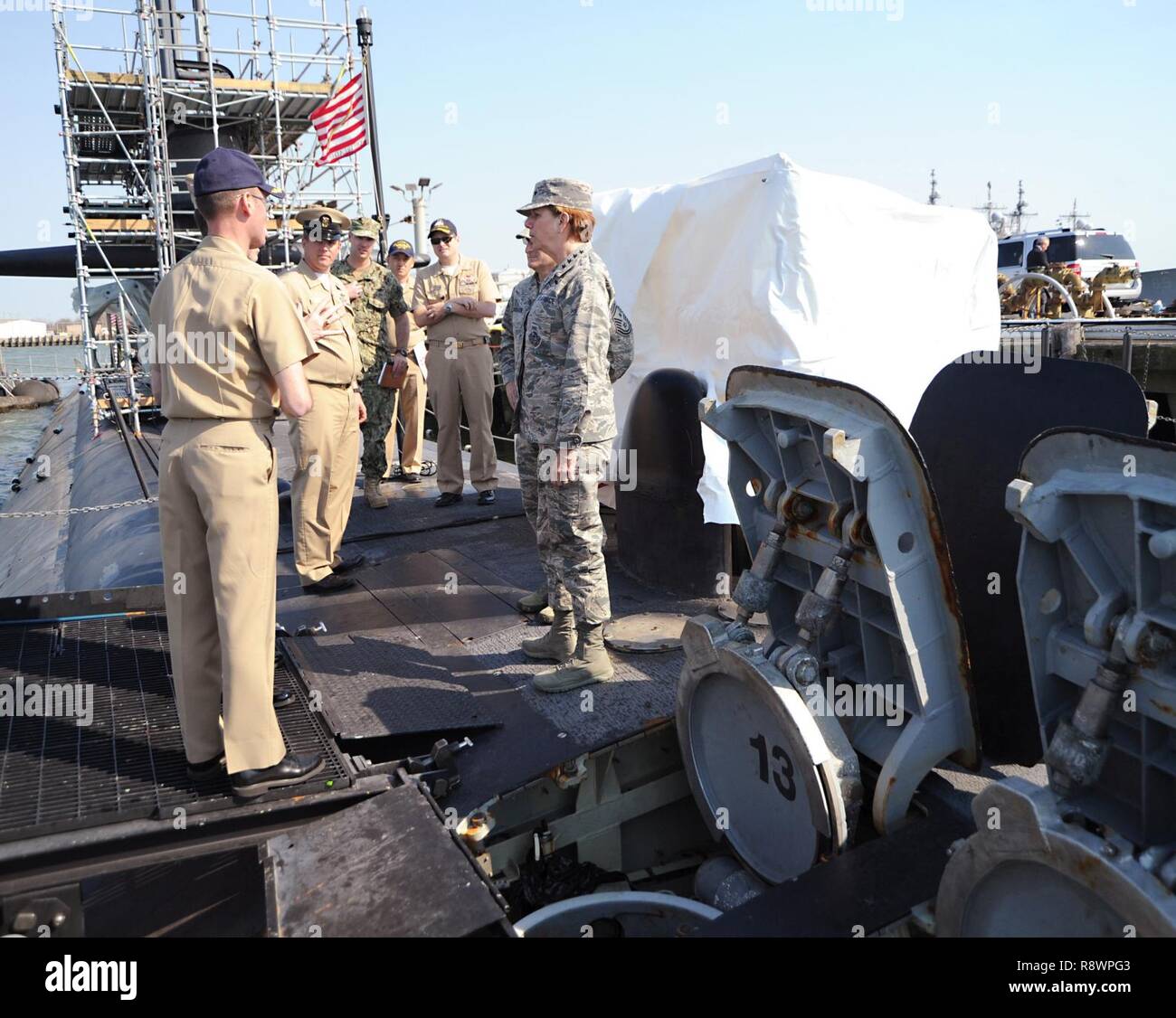 Cmdr. Michael Grubb, left, commanding officer USS Newport News (SSN 750 ...