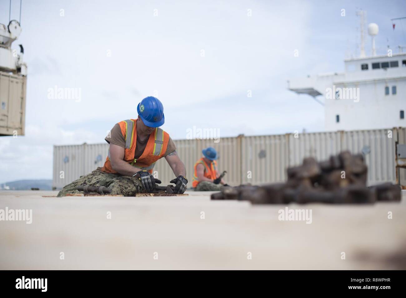 Boatswain’s Mate 2nd Class Mark Close, assigned to Navy Cargo Handling ...