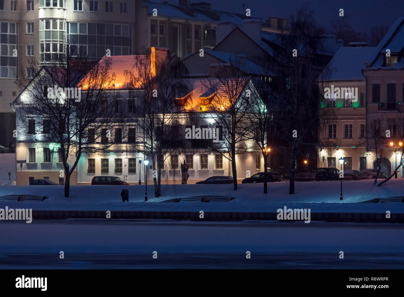 Scene of city residential area with illumination at night. Streets ...