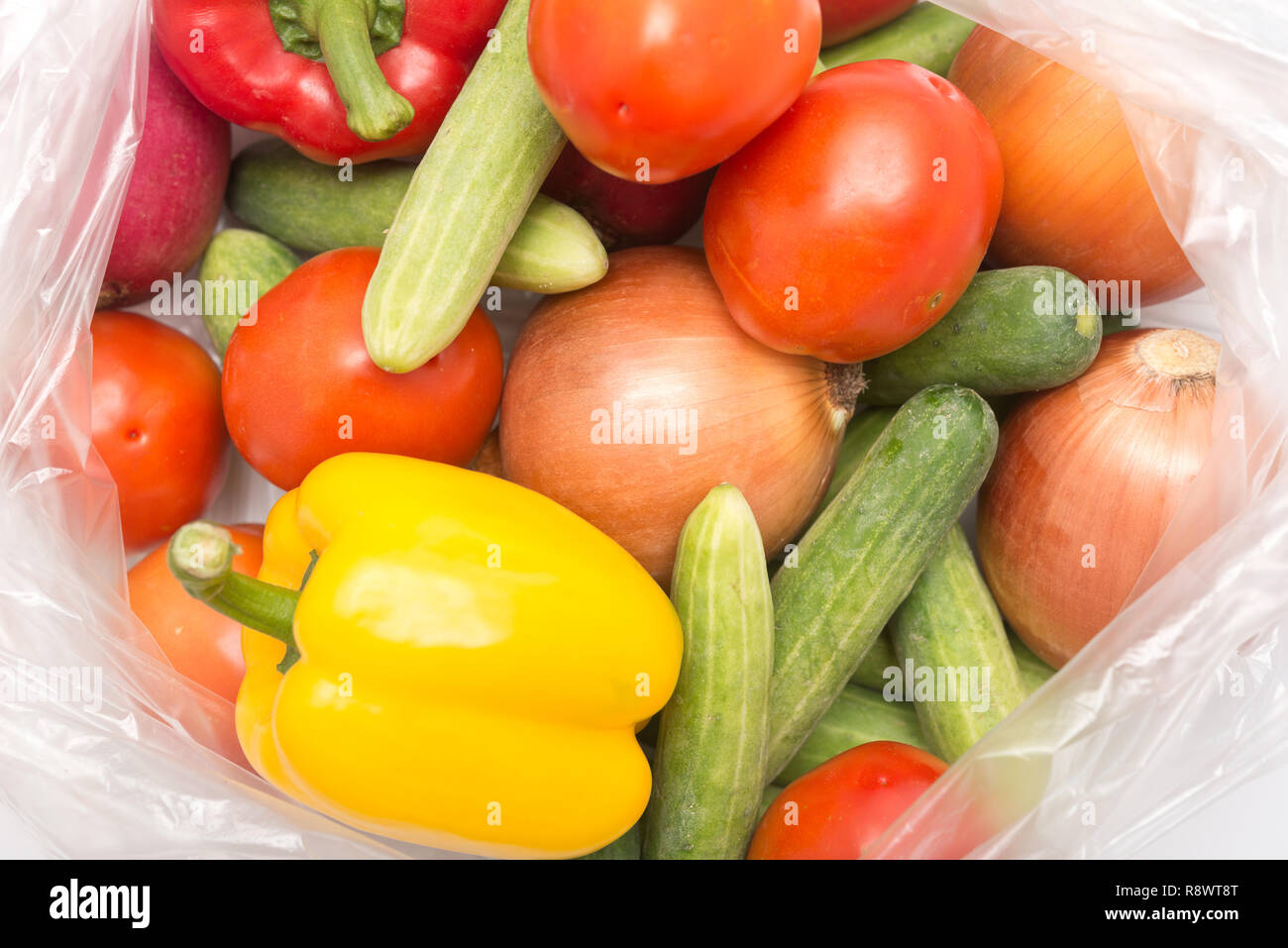 Fresh vegetables in packet isolated on white background Stock Photo - Alamy