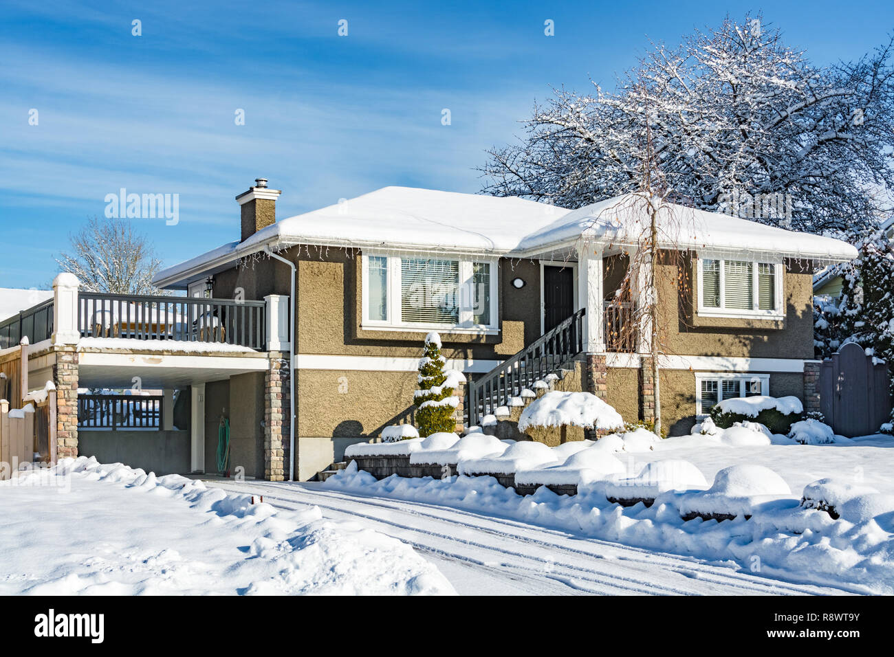 Big residential house in snow on winter season in Canada Stock Photo ...