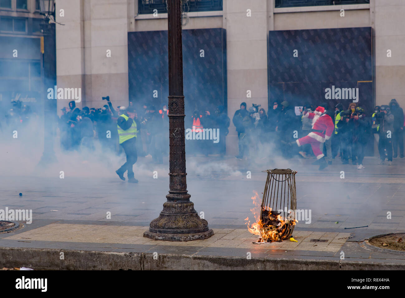 Riot police firing tear gas at Yellow Vests demonstration (Gilets ...