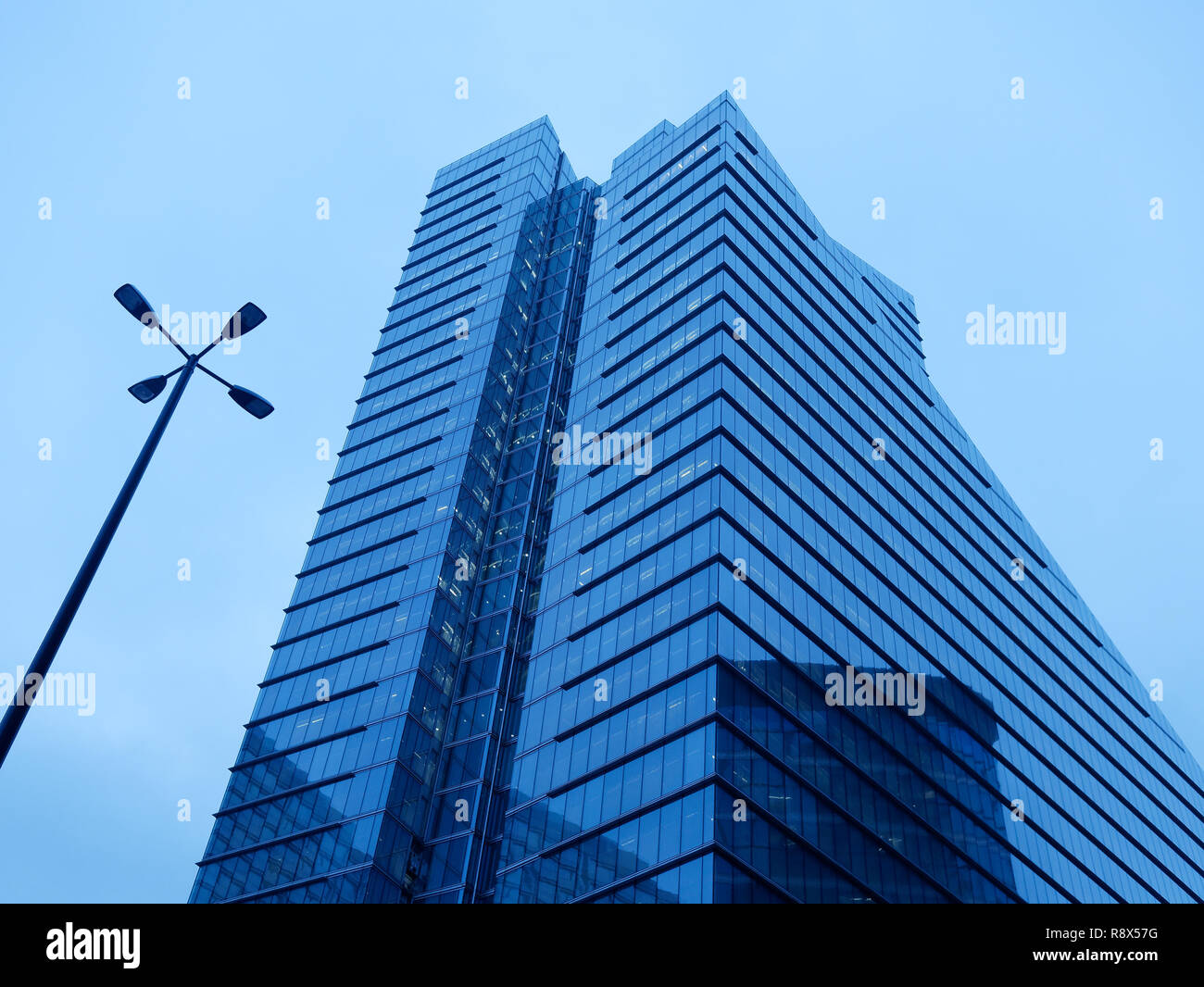 modern building skyscraper and street lamp Stock Photo - Alamy