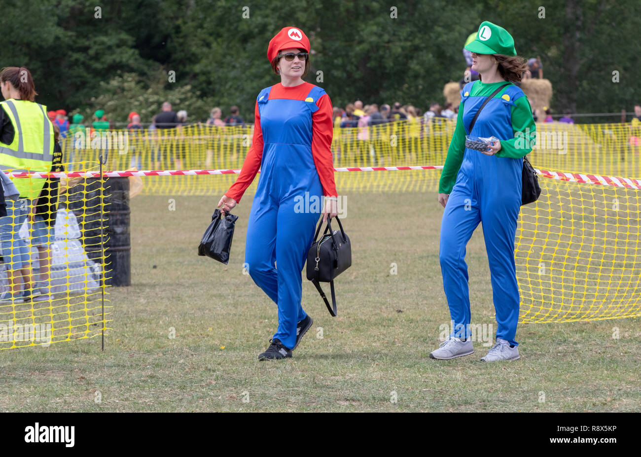 Young women dressed as Super Mario at an outdoor event Stock Photo - Alamy