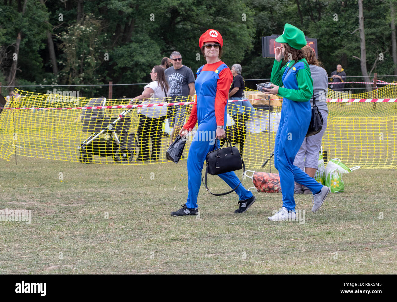 Young women dressed as Super Mario at an outdoor event Stock Photo - Alamy