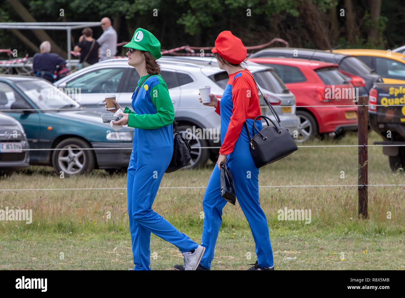 Young women dressed as Super Mario at an outdoor event Stock Photo - Alamy