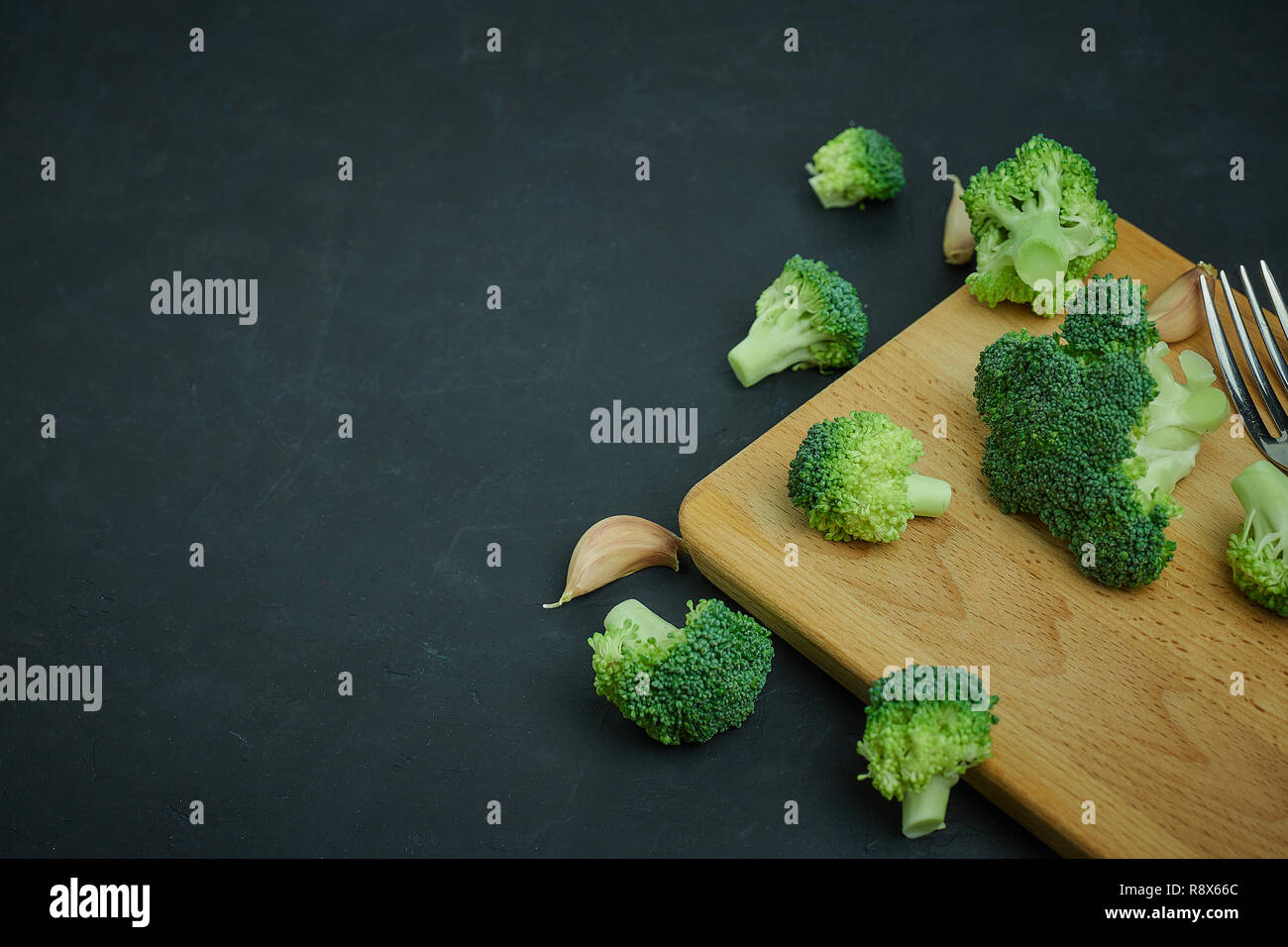 placer green broccoli segments from a small bucket. Healthy eating ...