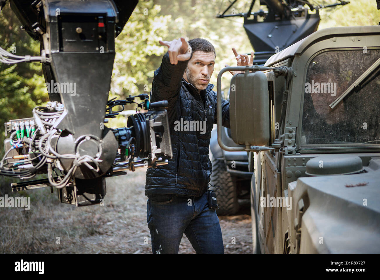 BUMBLEBEE, from left: director Travis Knight, John Cena, on set, 2018 ...