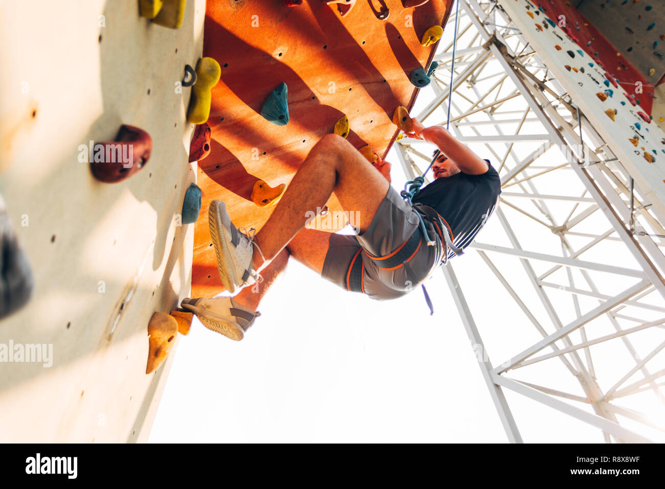 Active lifestyle and bouldering climbing, reaching the top concept ...