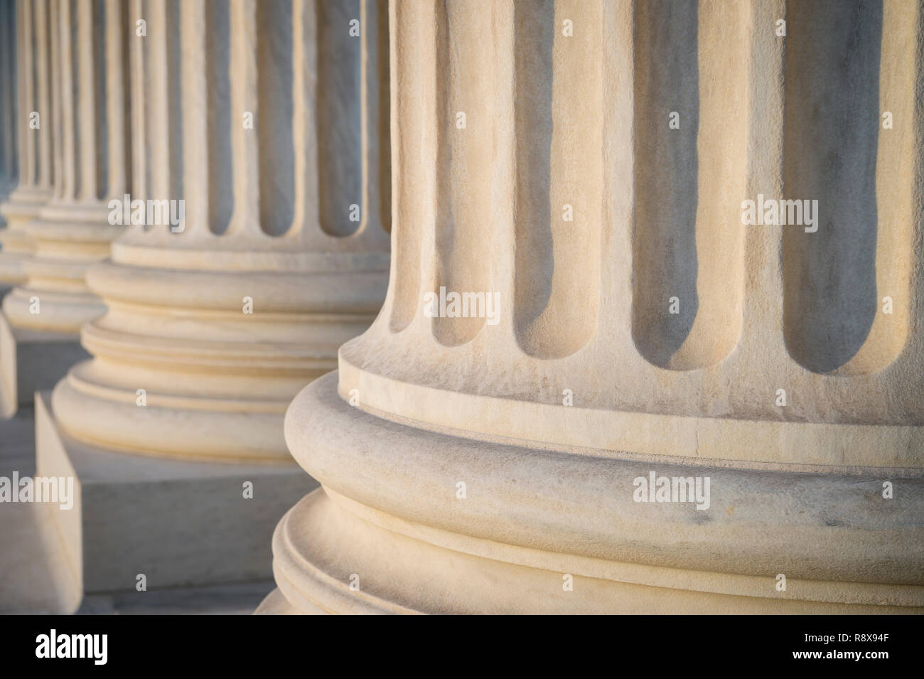 White marble neoclassical columns of the portico of the Supreme Court ...