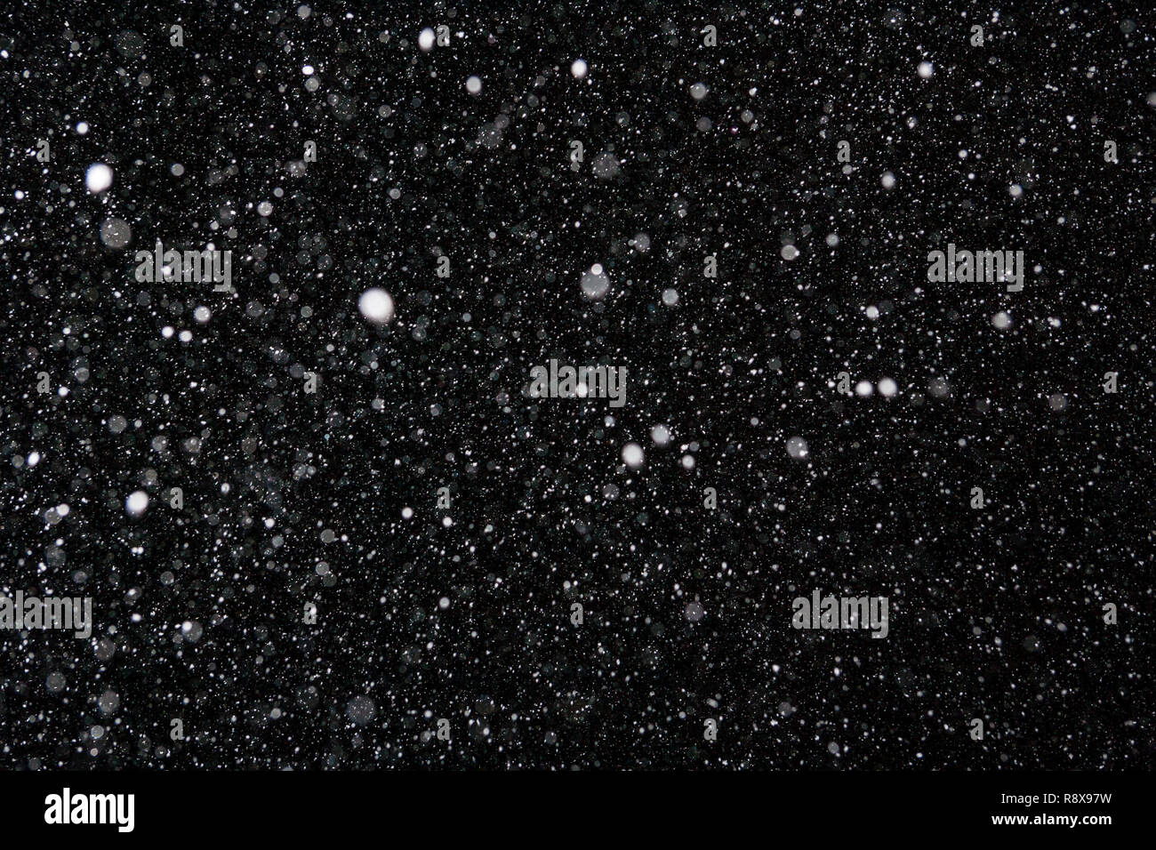 Falling snow at night Stock Photo - Alamy