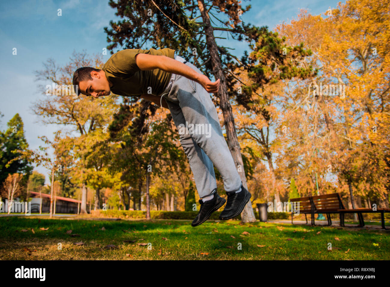 Young traceur doing frontflip jumping in nature Stock Photo - Alamy