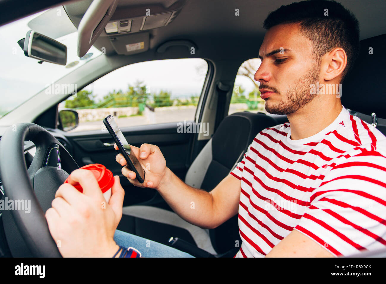 Guy driving hi-res stock photography and images - Alamy