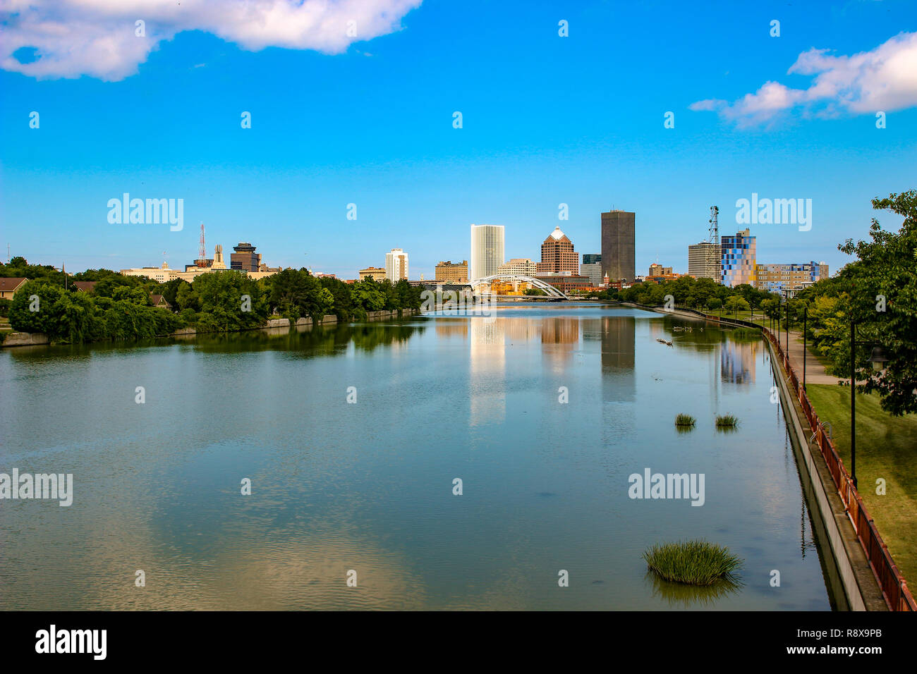 Skyline of Rochester, New York along Genesee River at sunset Stock ...