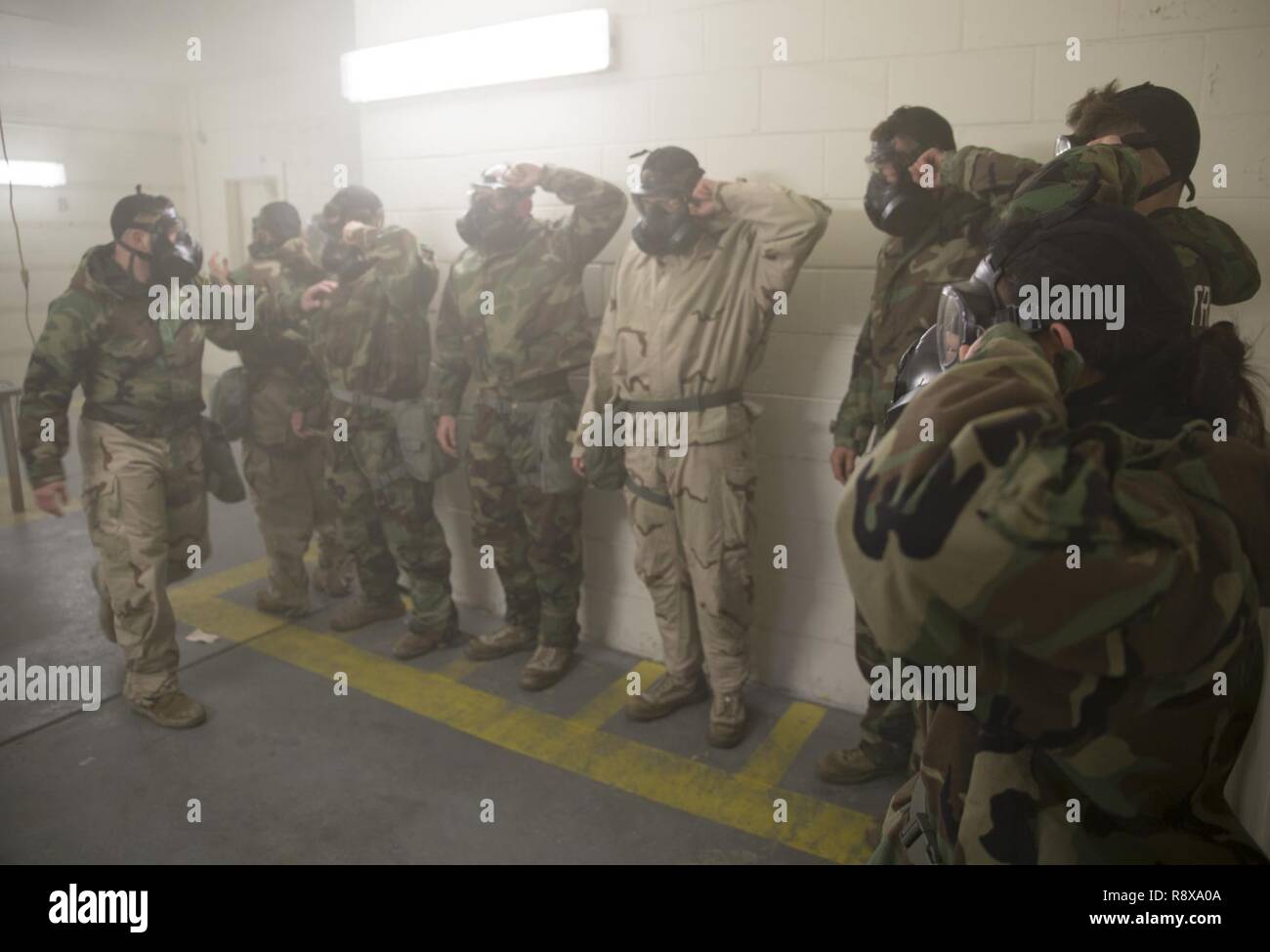 Marines are inspected to ensure the seal of their mask is working ...