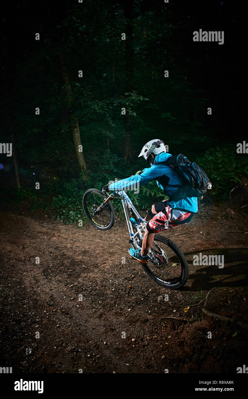 Professional cyclist race in forest hi-res stock photography and images ...
