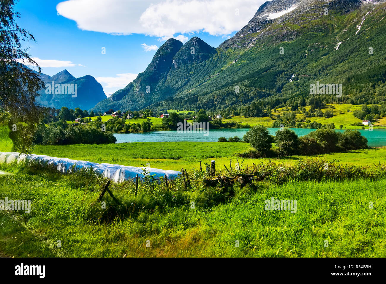 Norwegian village landscape with Nordfjord fjord, mountains and ...