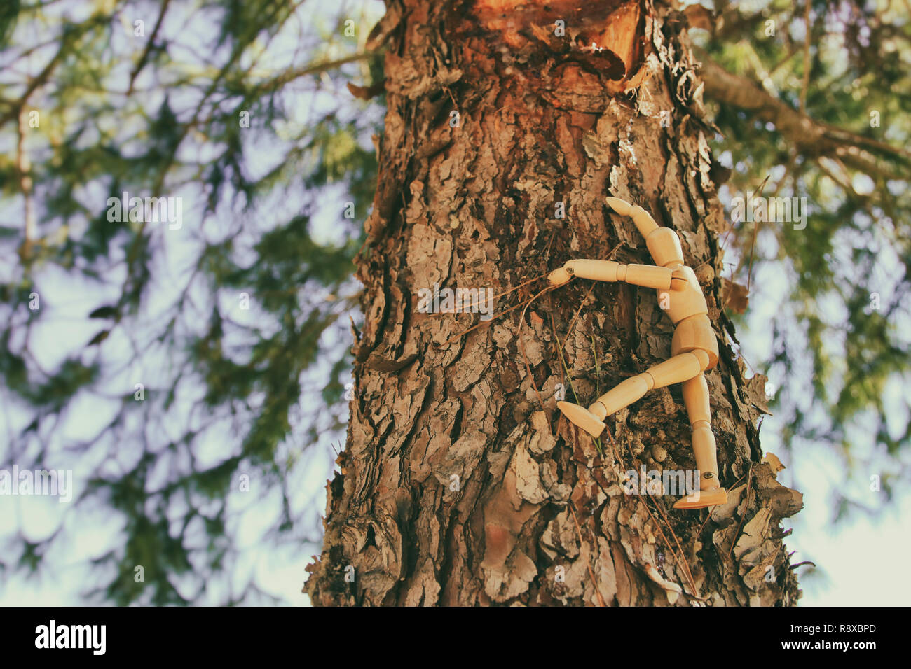 concept of vision and different thinking. wooden dummy sitting on top ...