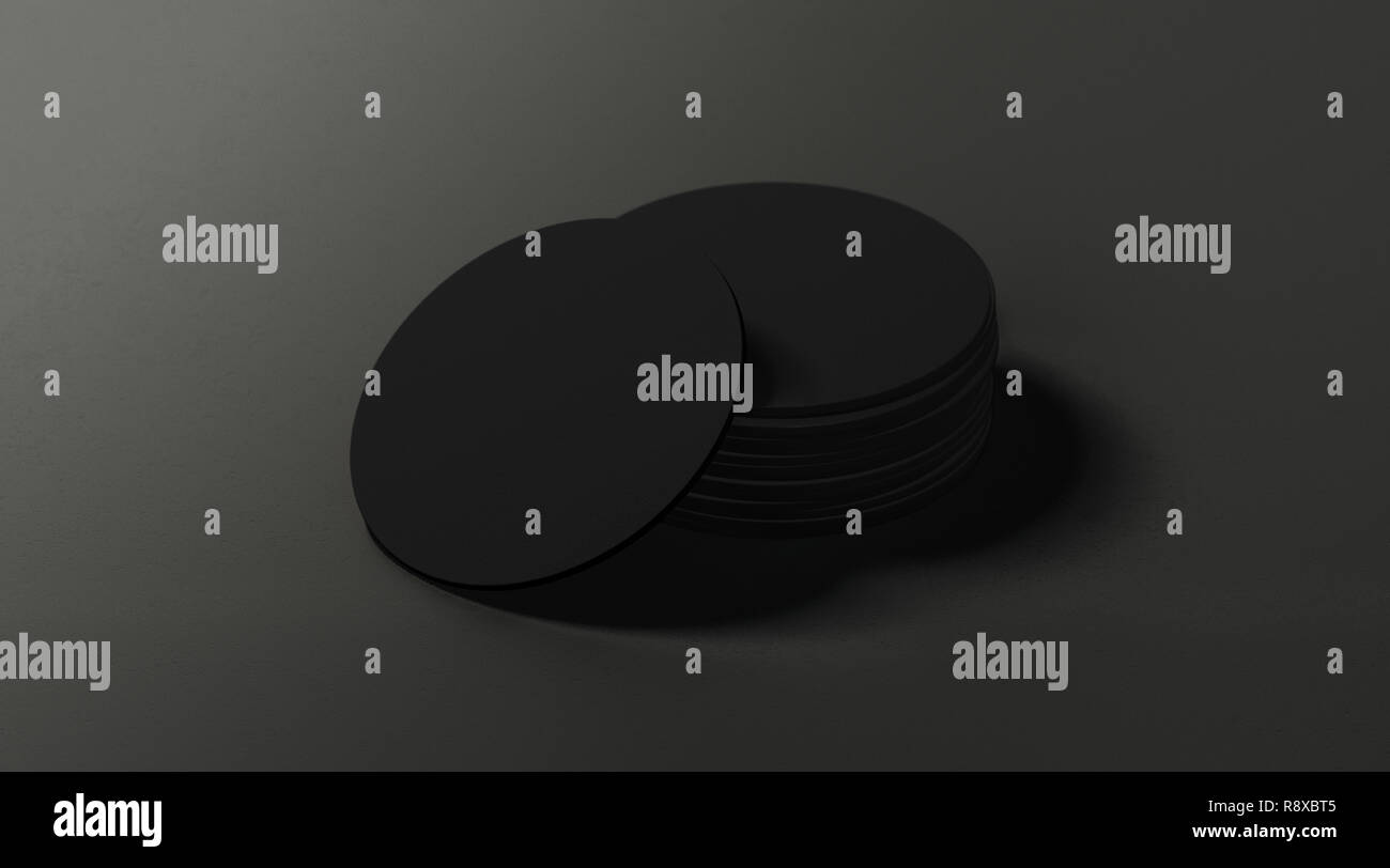 Blank black round beer coasters stack mockup on dark surface, depth of ...