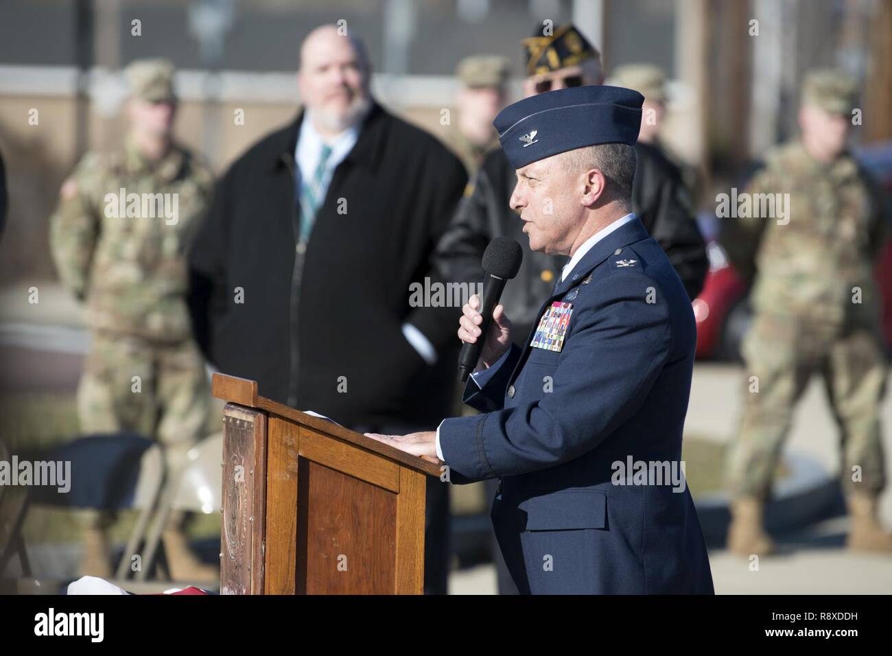 Colonel Peter T. Green III, 104th Fighter Wing commander, speaks at a ...